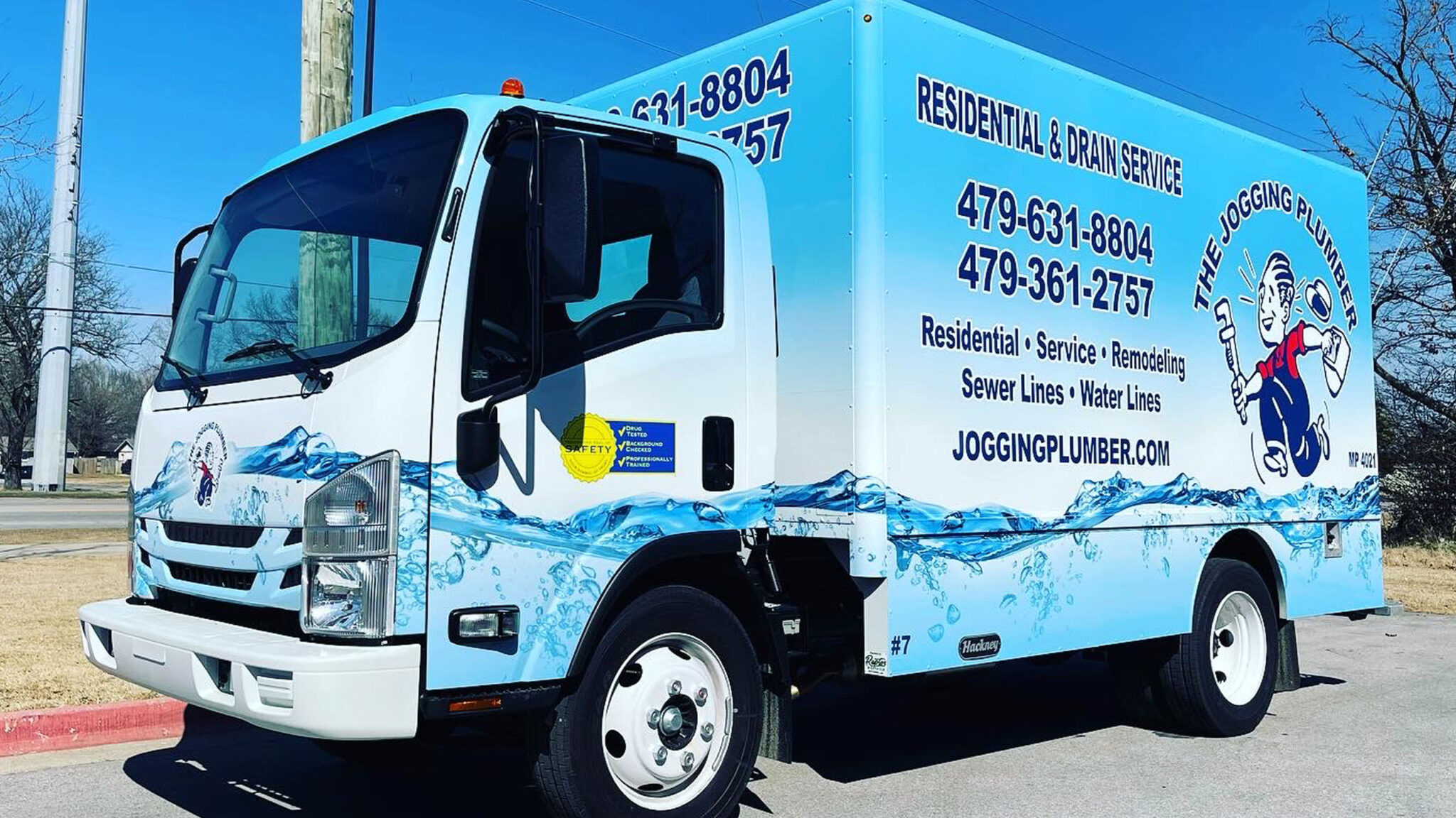 The Jogging Plumber Fleet Wraps - Raptor Wrap & Sign